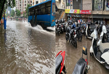 સુરતમાં આવેલા અચાનક વરસાદના ઝાંપટાના કારણે અડાજણ સહિત અનેક જગ્યાએ પાણી ...